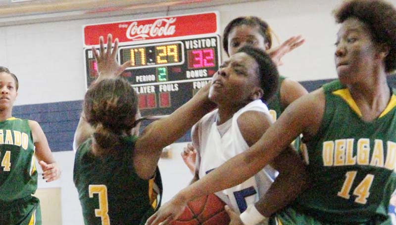 Lady Wolves feast on Delgado, Dolphins edge Co-Lin | Daily Leader