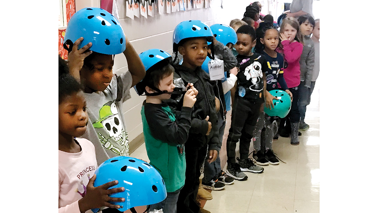 Elementary students receive safety helmets | Daily Leader